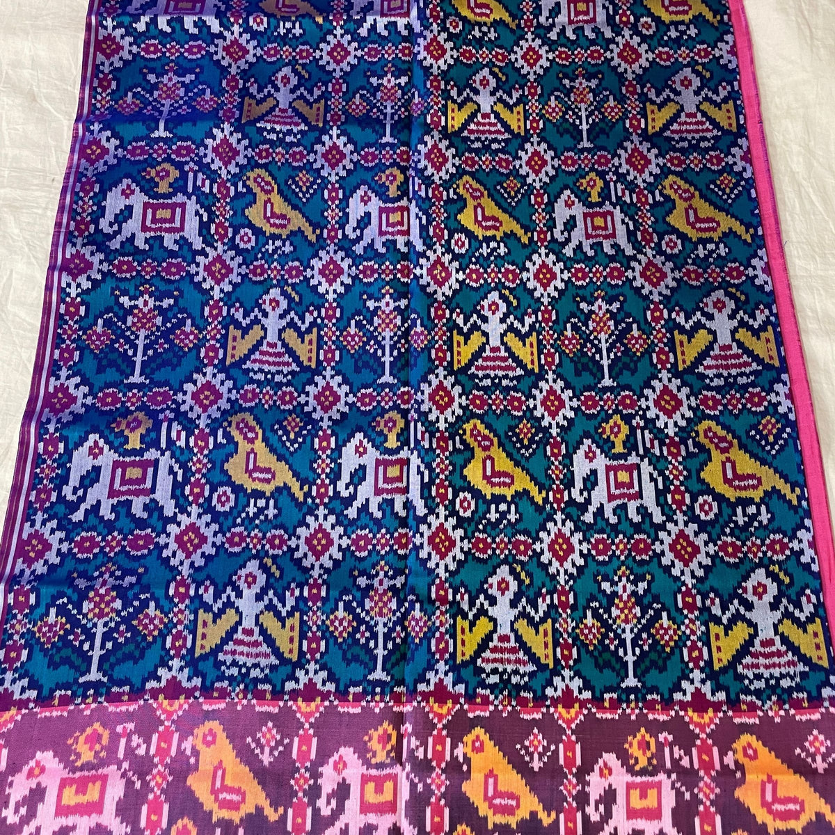 Rangoli Design With Elephant Motifs With Elephant And Parrot Border An ...